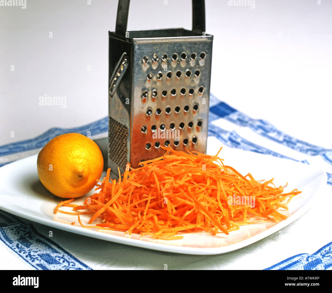 Carrot rasped rasper lemon Stock Photo - Alamy