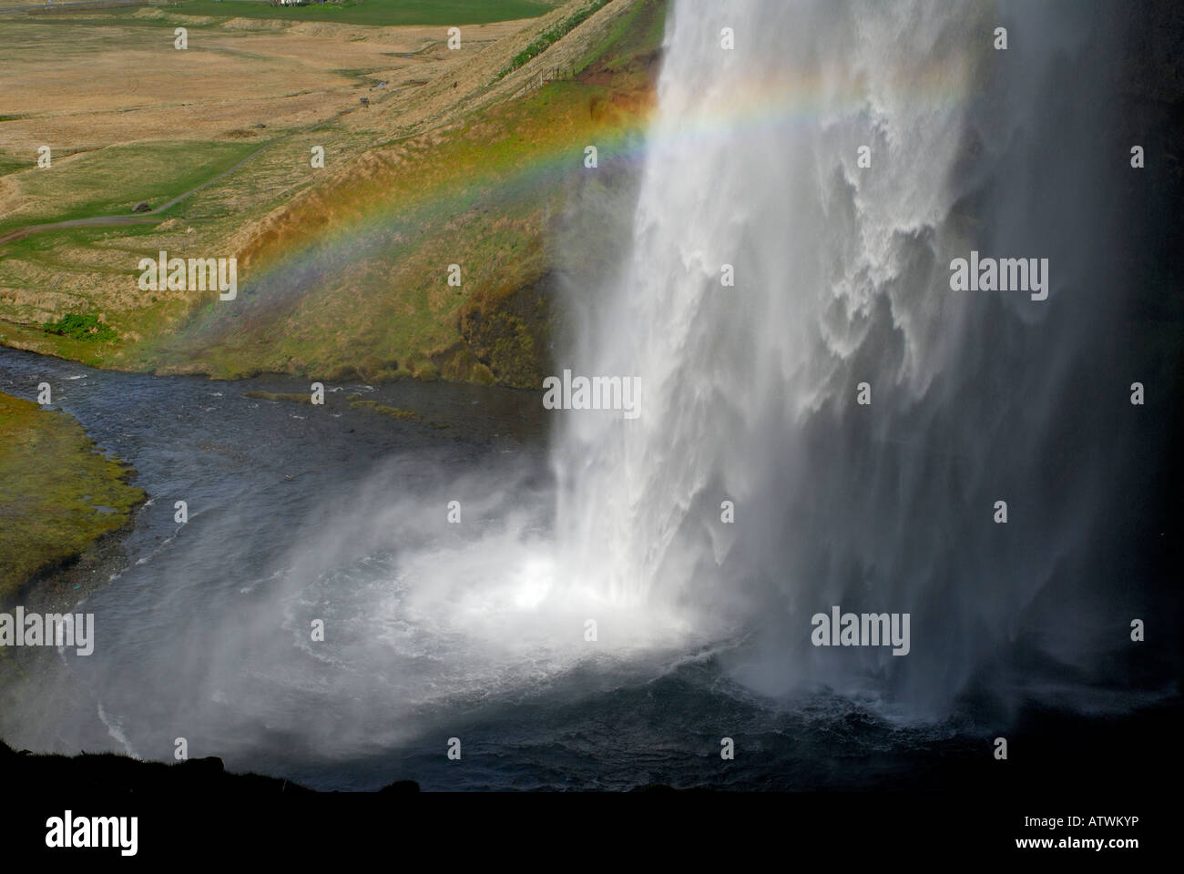 Landscape of Iceland Rainbow over Seljalandsfoss waterfall Iceland ...