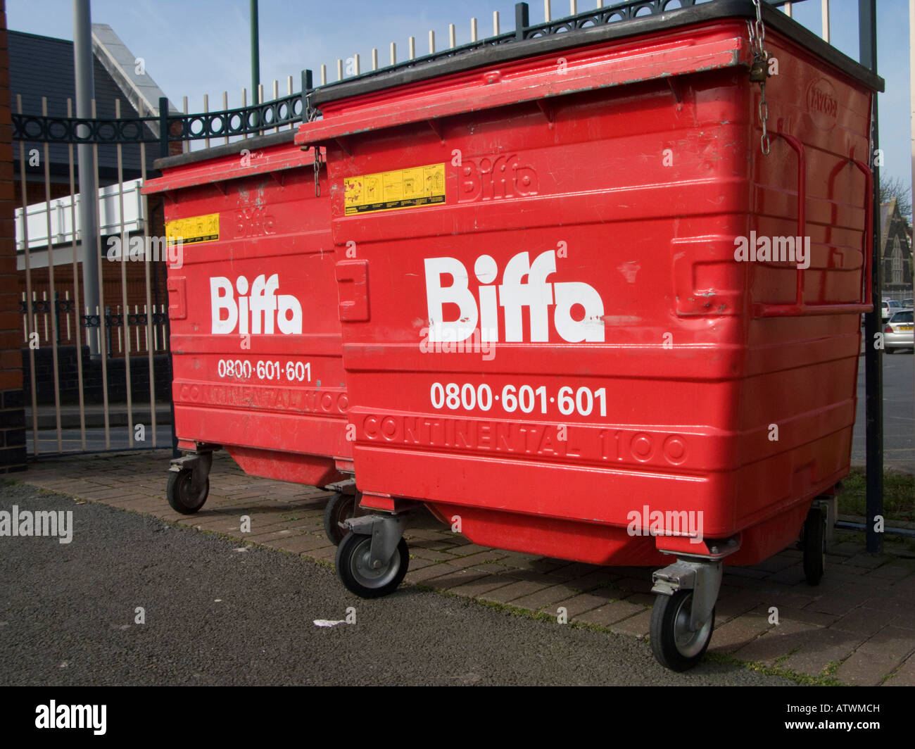 2 two Biffa red wheelie bins Stock Photo - Alamy