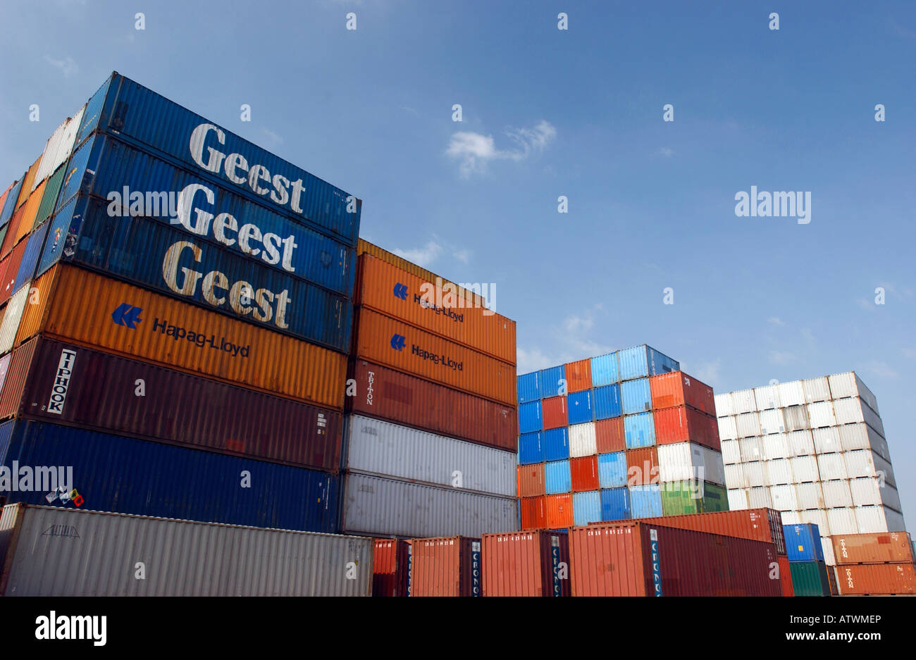 Shipping containers stacked in port Stock Photo - Alamy