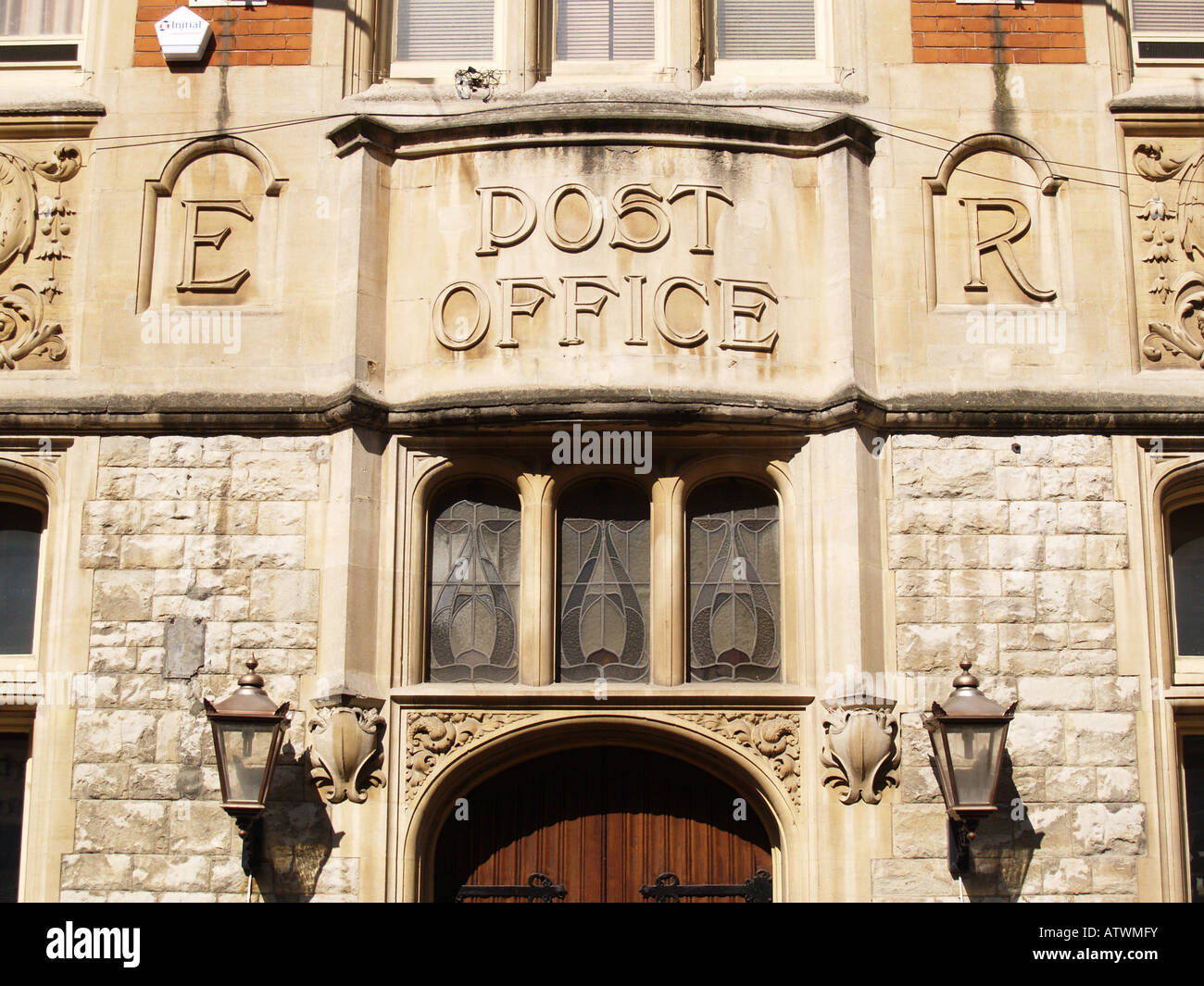 old post post office front wall windows facade Stock Photo - Alamy