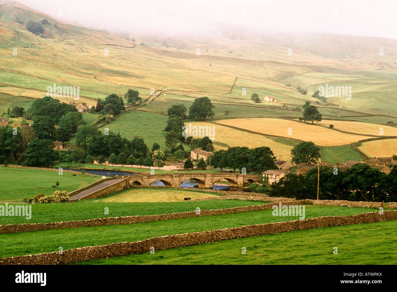 Bridge and fields, Burnsall, Yorkshire Dales National Park, England ...