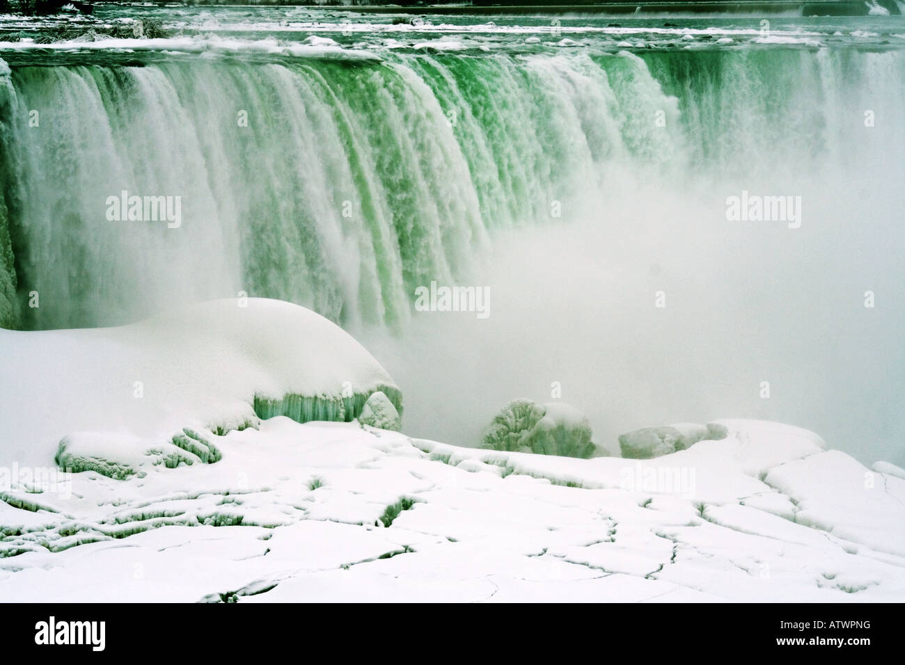 Horseshoe Falls of Niagara Falls in snow and frozen rain in spring ...