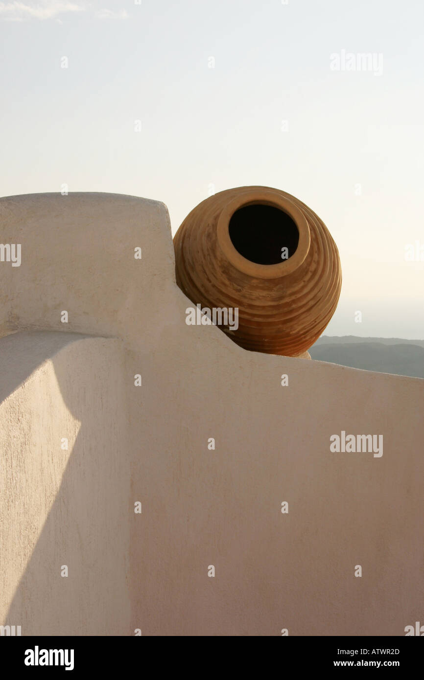 Greek pot on a wall in Fira, Santorini Stock Photo - Alamy