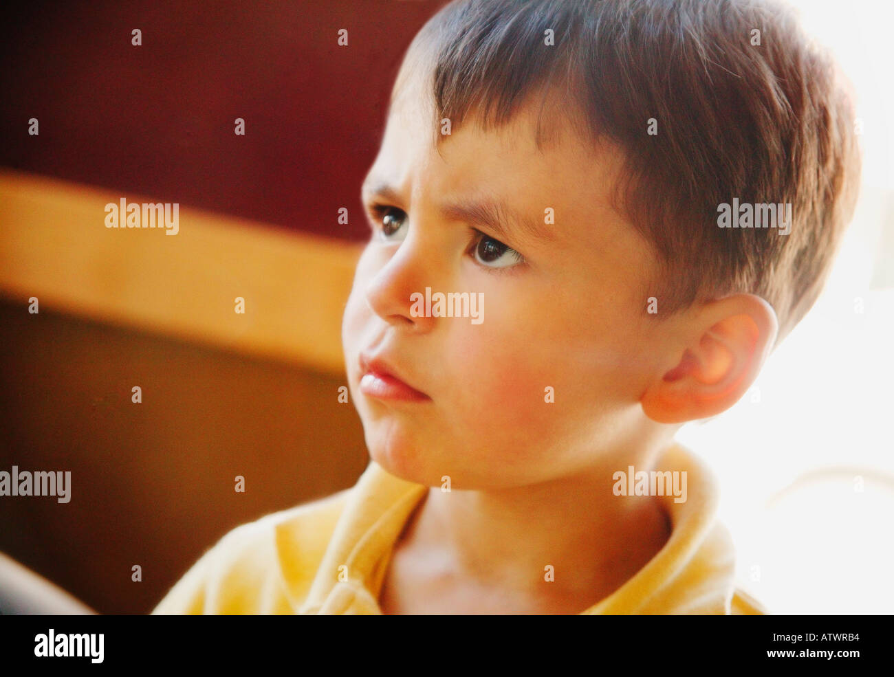 Puzzled little boy Stock Photo - Alamy