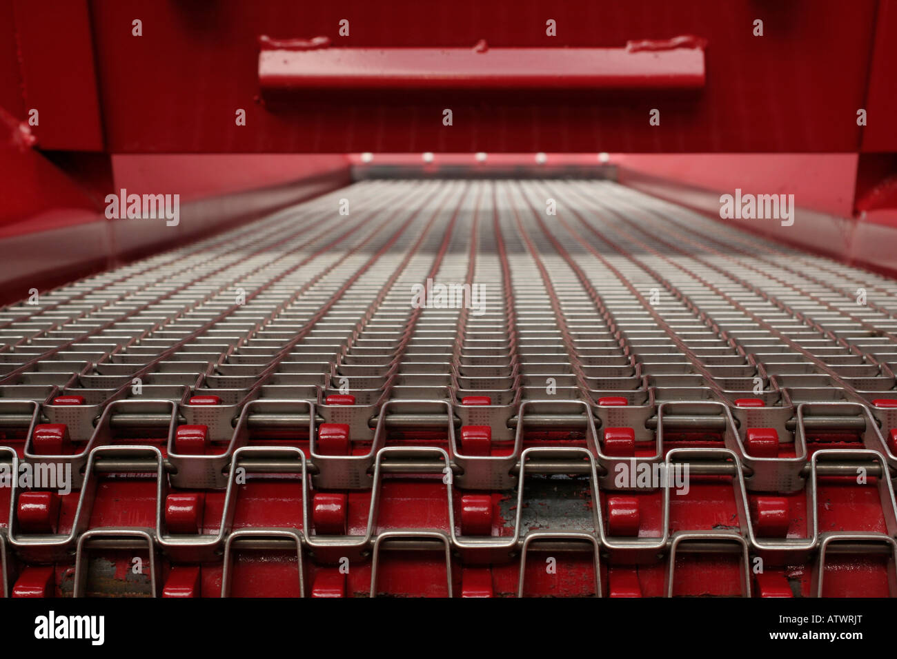 Feed apron on agricultural equipment Stock Photo - Alamy