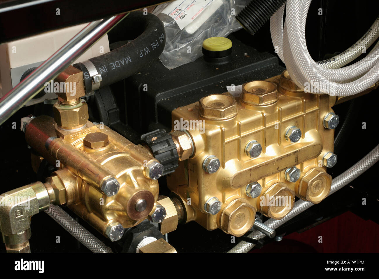 Brass valves and feedwater pump Stock Photo - Alamy