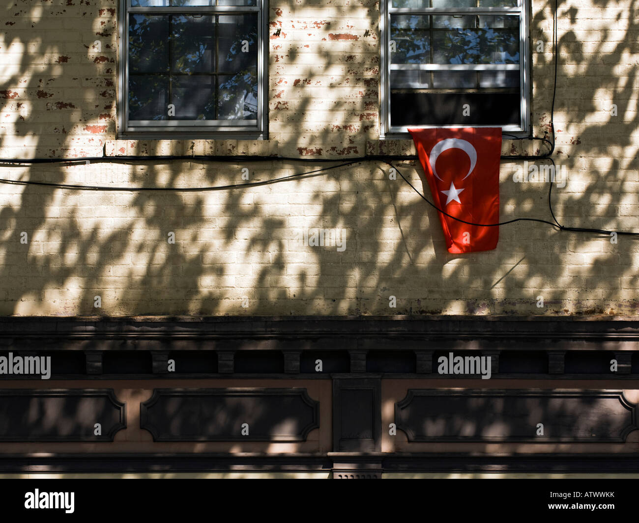 Flag of Turkey hangs outside second story apartment window Stock Photo ...