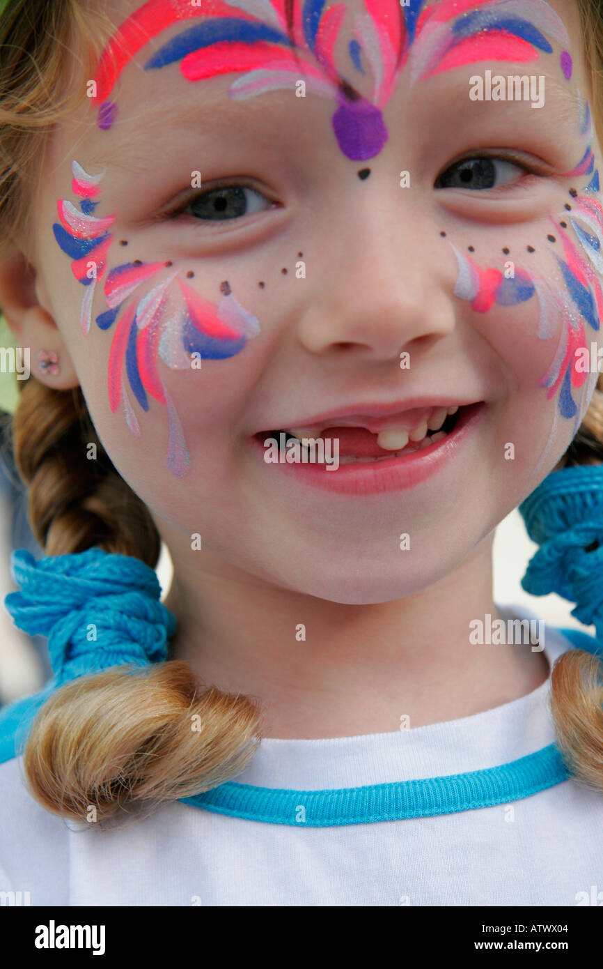Little girl with painted face Stock Photo - Alamy