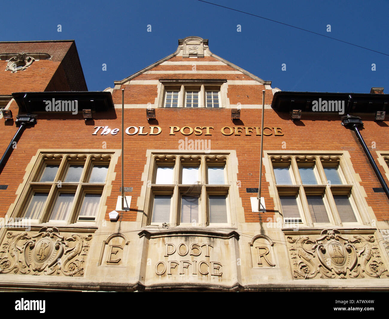 old post post office front wall windows facade Stock Photo - Alamy