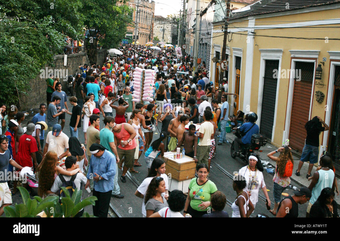 Crowds of tourists and locals in street carnival bloco in Santa Teresa ...