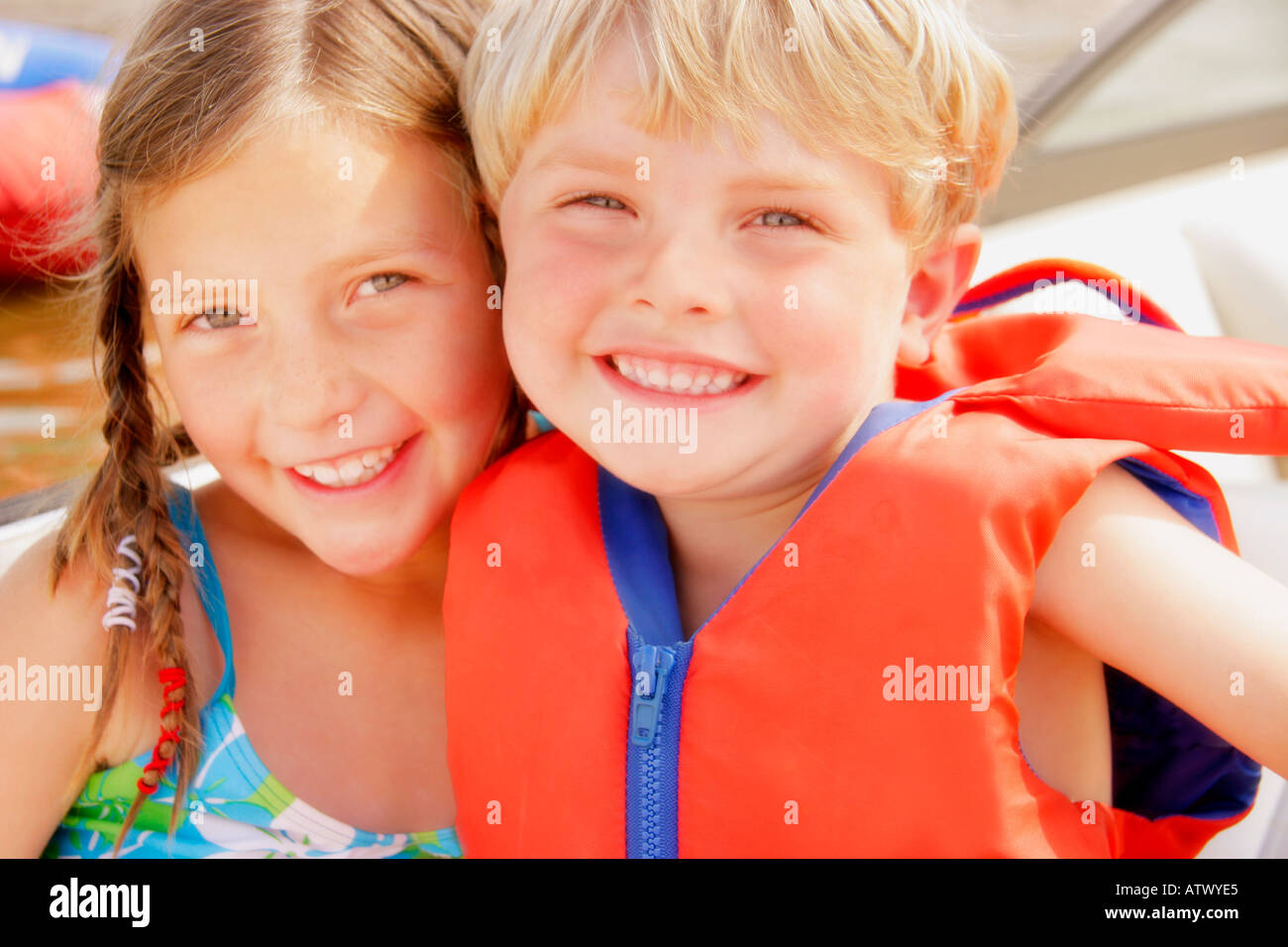 Two children hugging outdoors (outside Stock Photo - Alamy