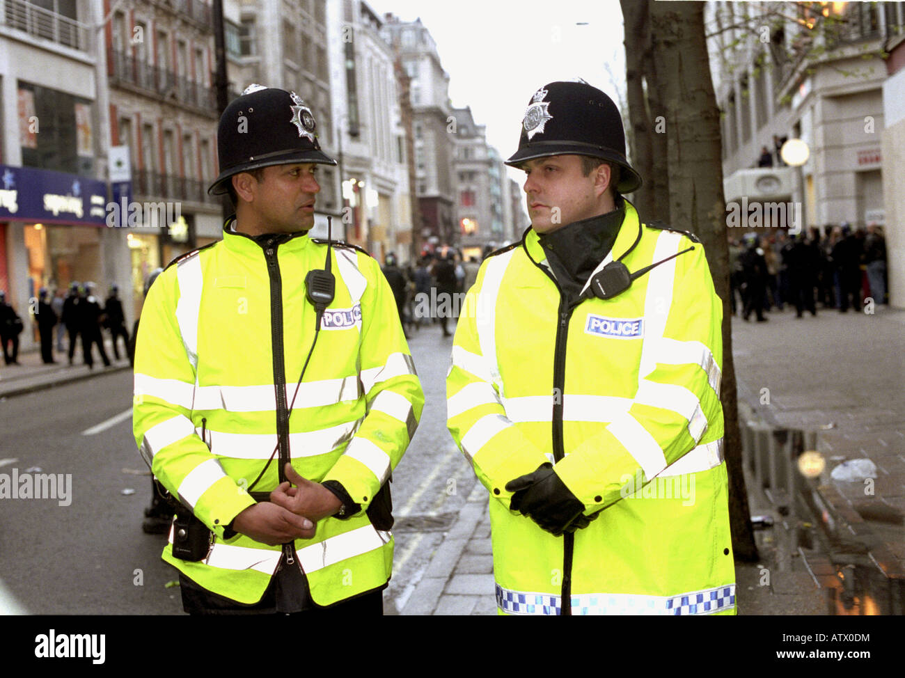 Police officers chatting to each other on duty in London demonstration ...