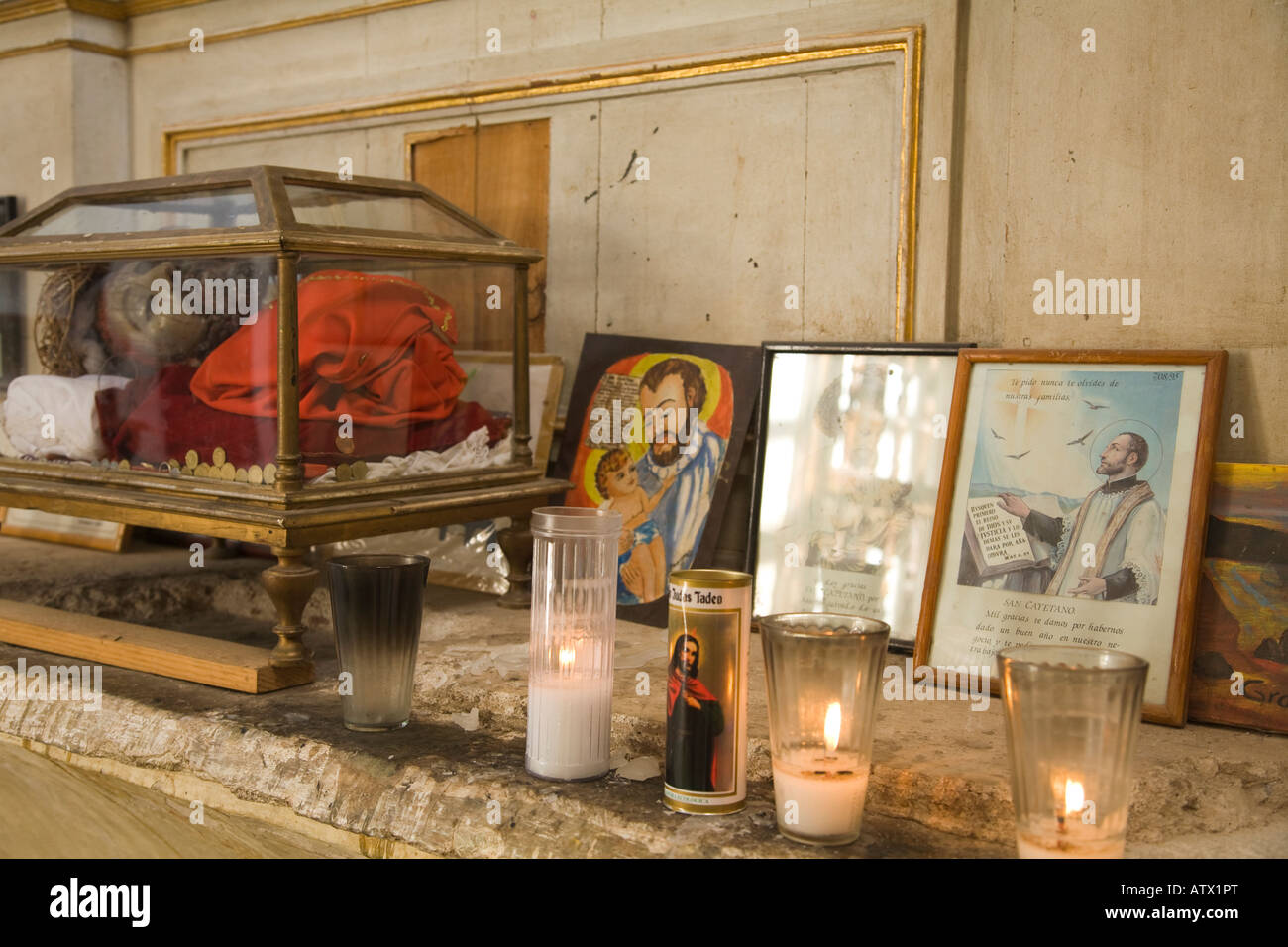 MEXICO Valenciana Head of Jesus Christ in glass box offering candles ...