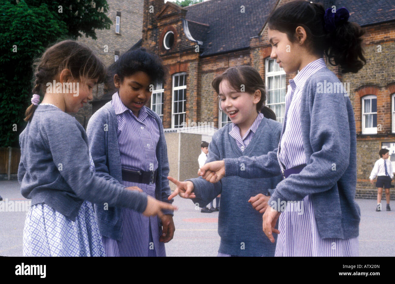 School children playing in playground hi-res stock photography and ...