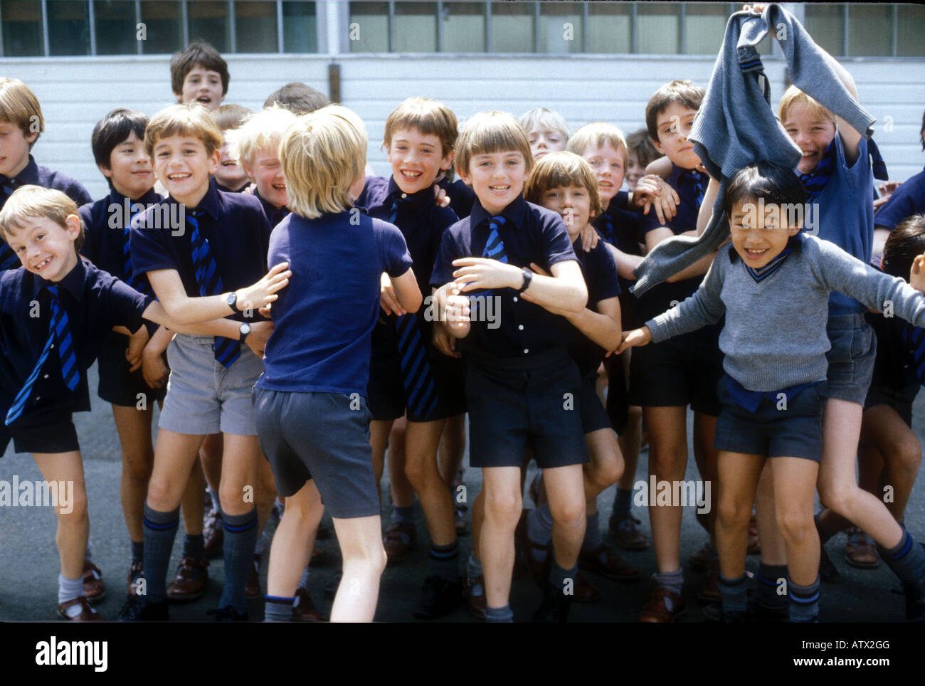 A group of primary schoolchildren a break time at private school Stock ...