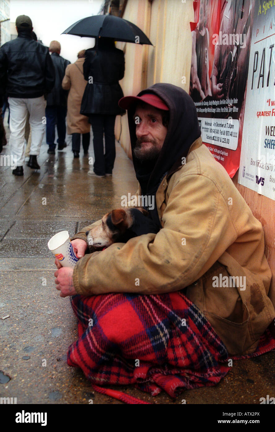 Homeless man begging on Oxford street London Stock Photo - Alamy