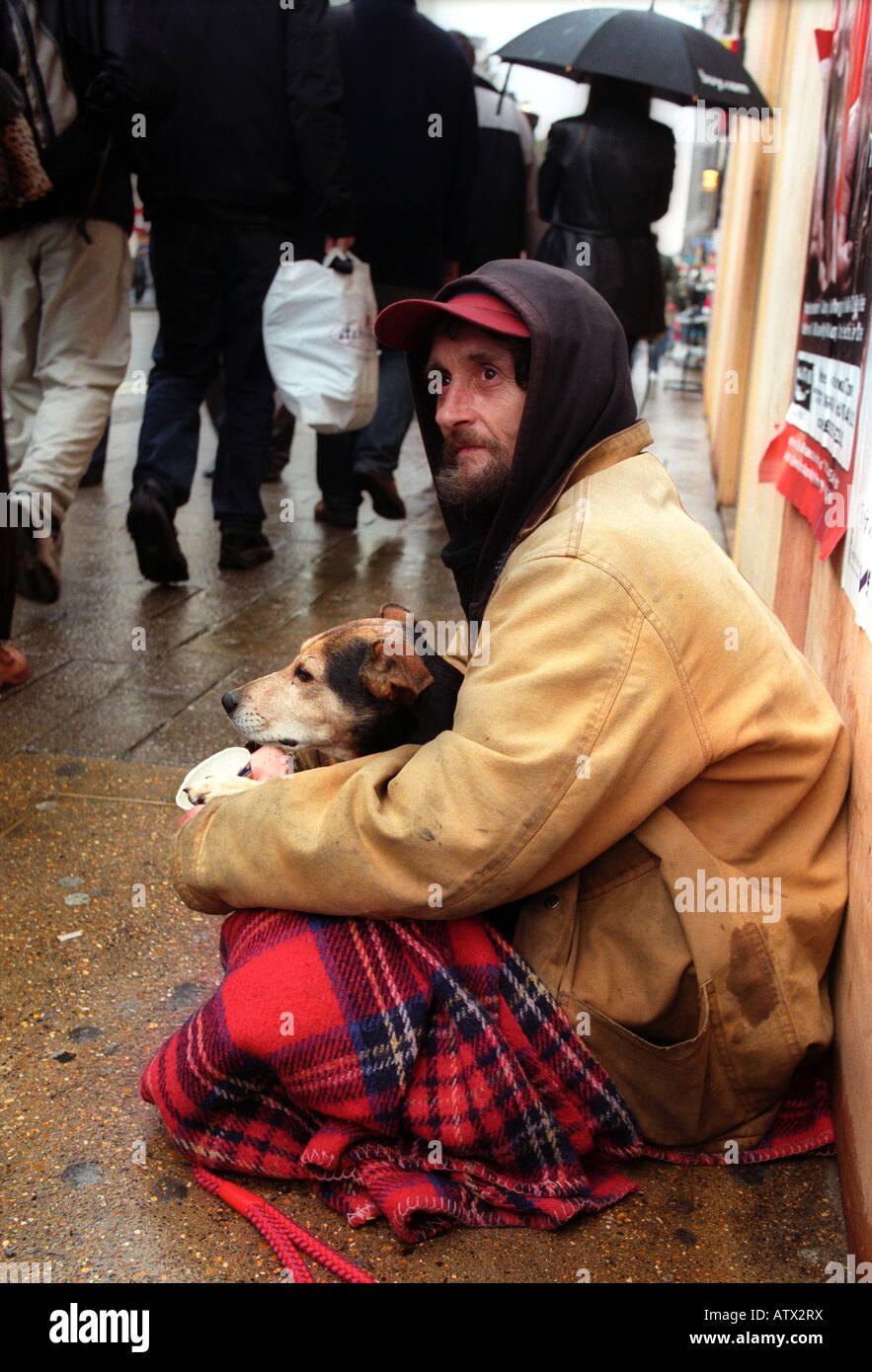 Homeless man begging on Oxford street London Stock Photo - Alamy