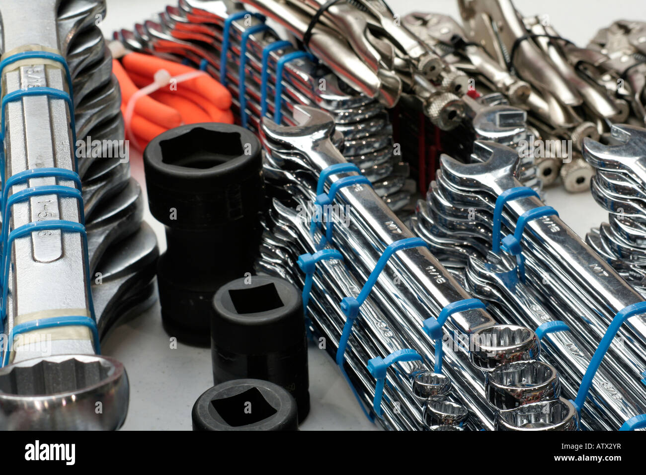 Bundles of tools for sale at tool show Stock Photo - Alamy