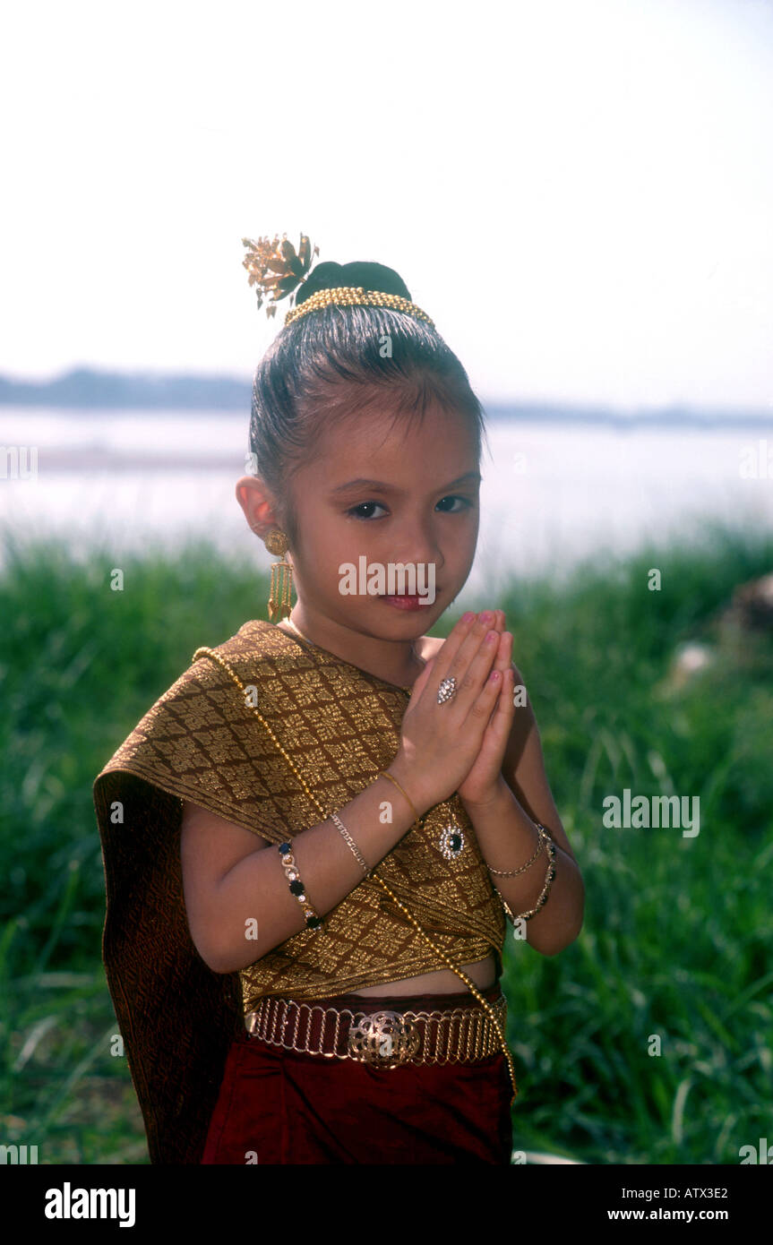 YOUNG GIRL IN TRADITIONAL DRESS BY THE BANKS OF THE MEKONG VIENTIANE ...