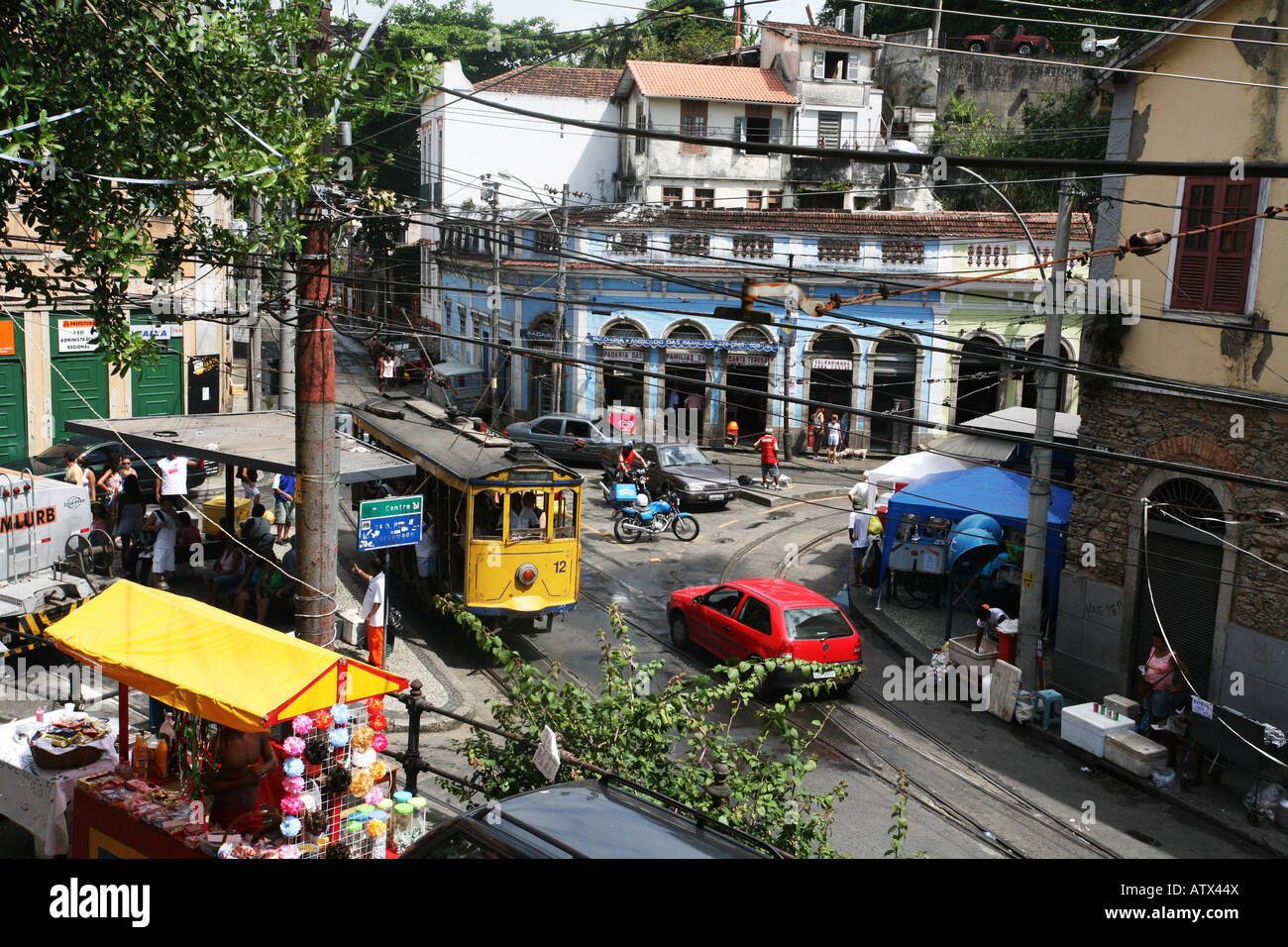 Yellow traditional trams in the main square of Santa Teresa, Rio de ...