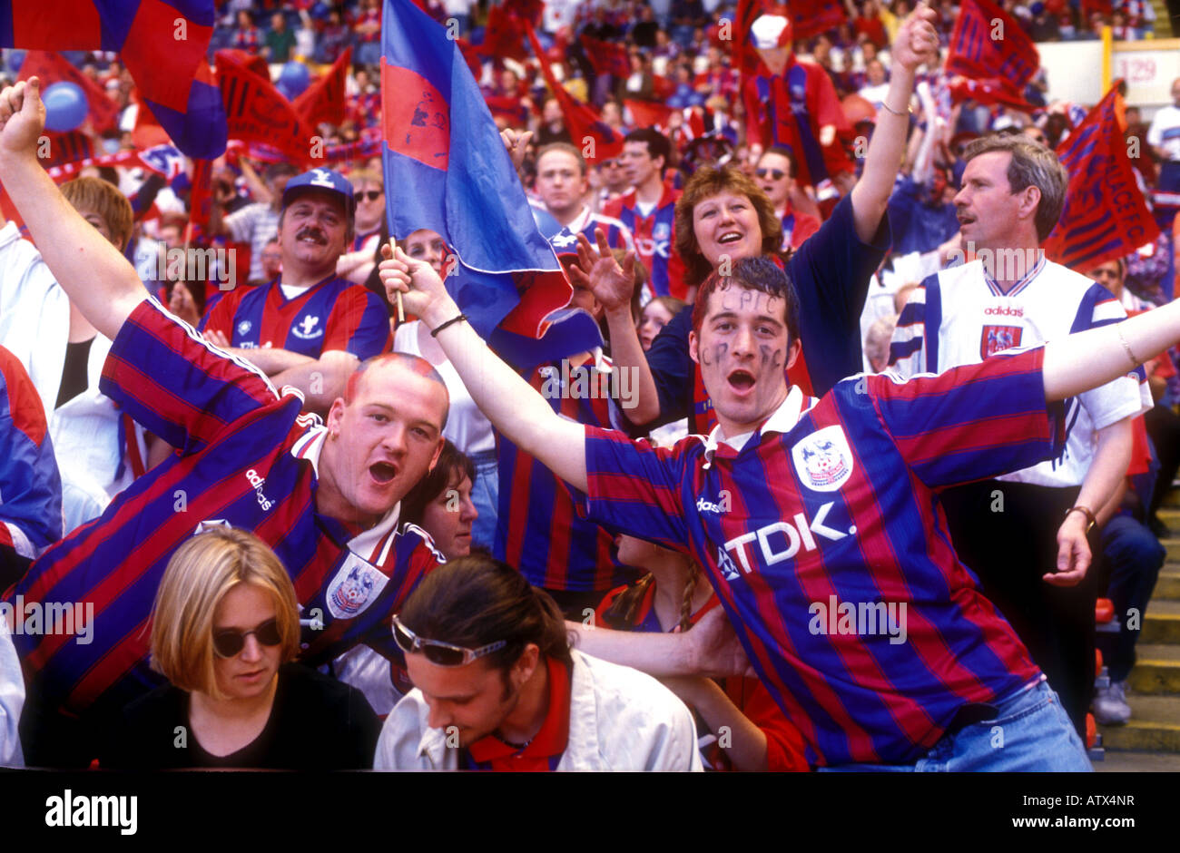 Football fans at football match in Wembley stadium Stock Photo - Alamy