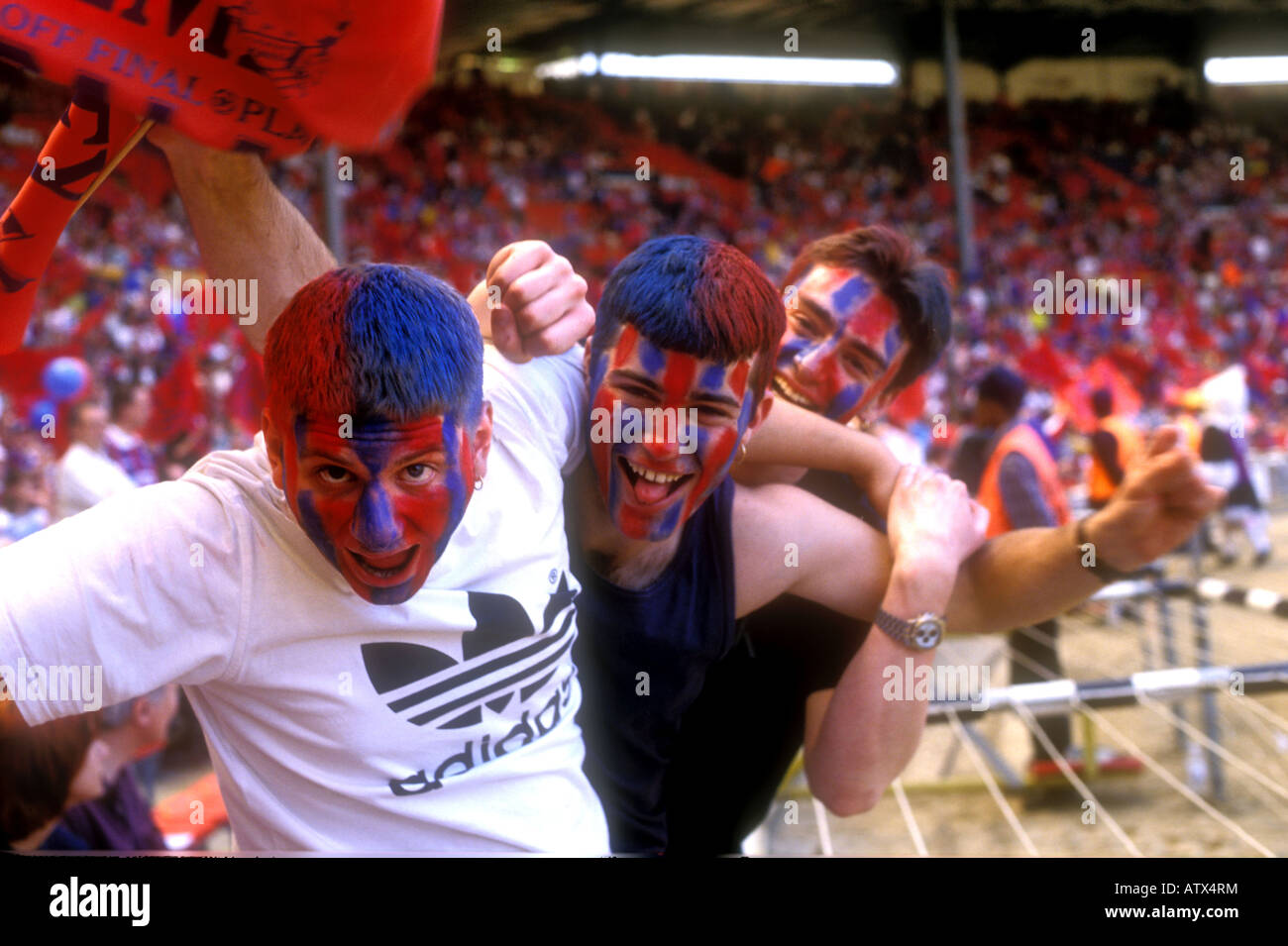 Football fans at football match in Wembley stadium Stock Photo - Alamy