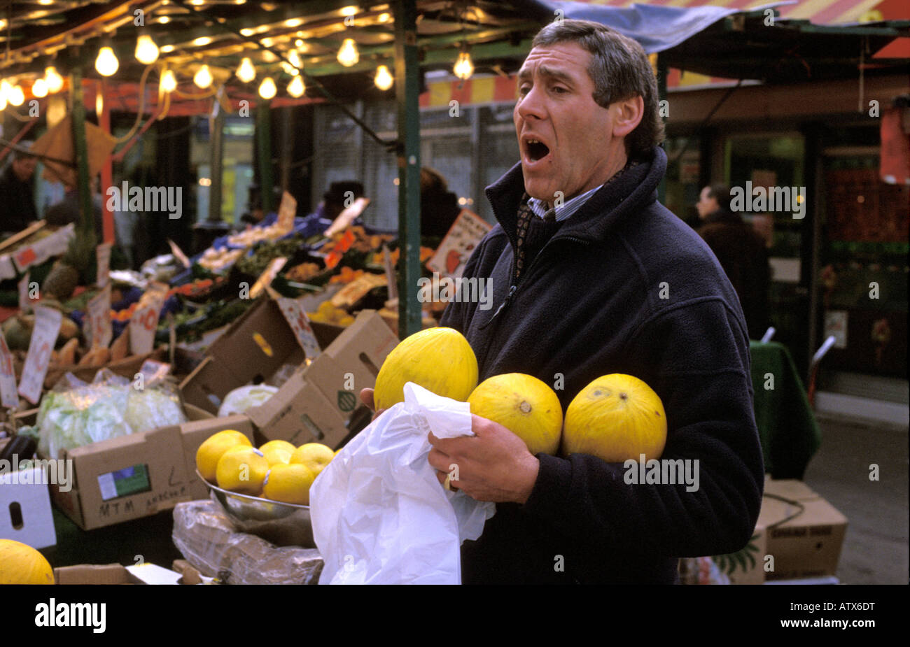 Market trader shouting hi-res stock photography and images - Alamy