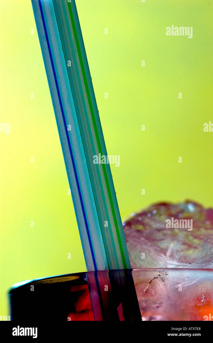 abstract image of ice cold drink of coke with straws Stock Photo - Alamy