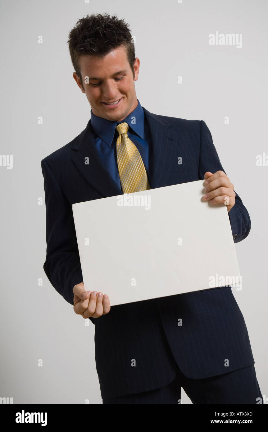 Man holding blank sign Stock Photo - Alamy