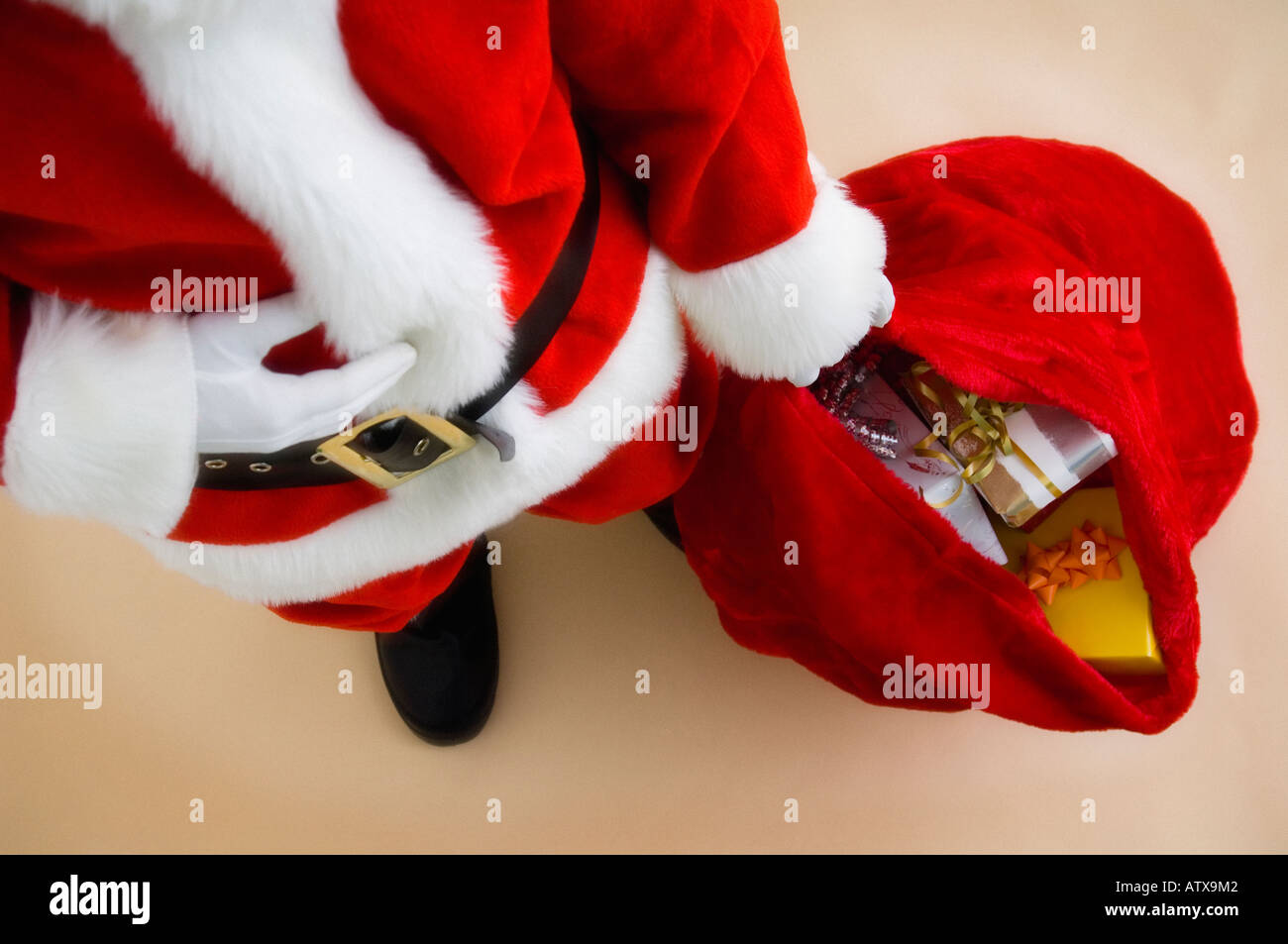 Santa with bag of gifts Stock Photo - Alamy