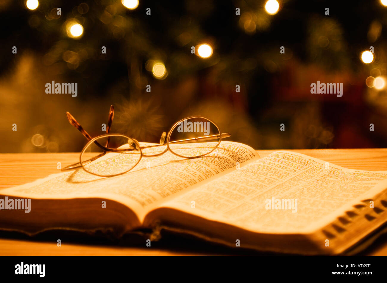 Holy Bible with eyeglasses Stock Photo - Alamy
