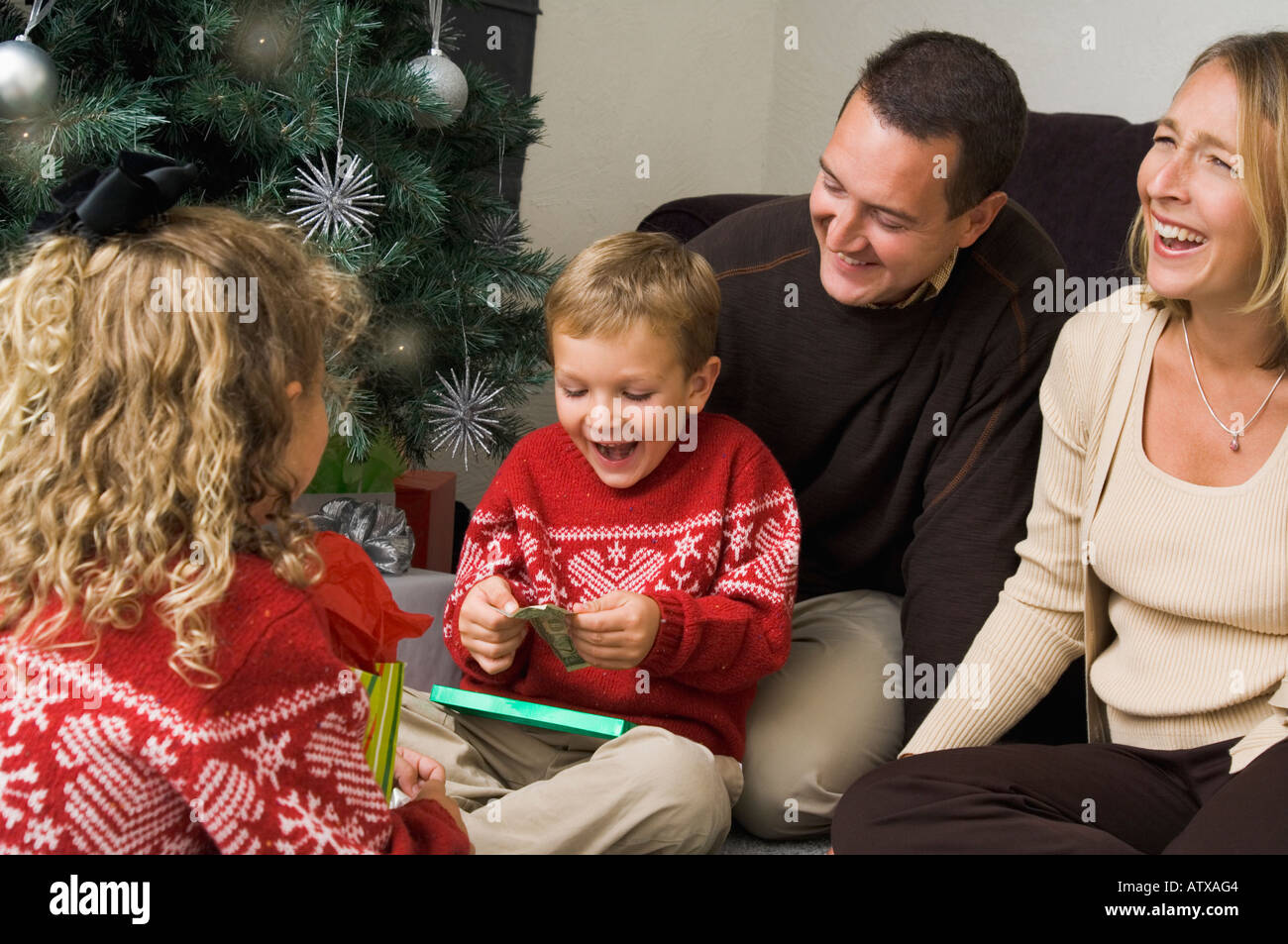 Mom son opening present gift hi-res stock photography and images - Alamy