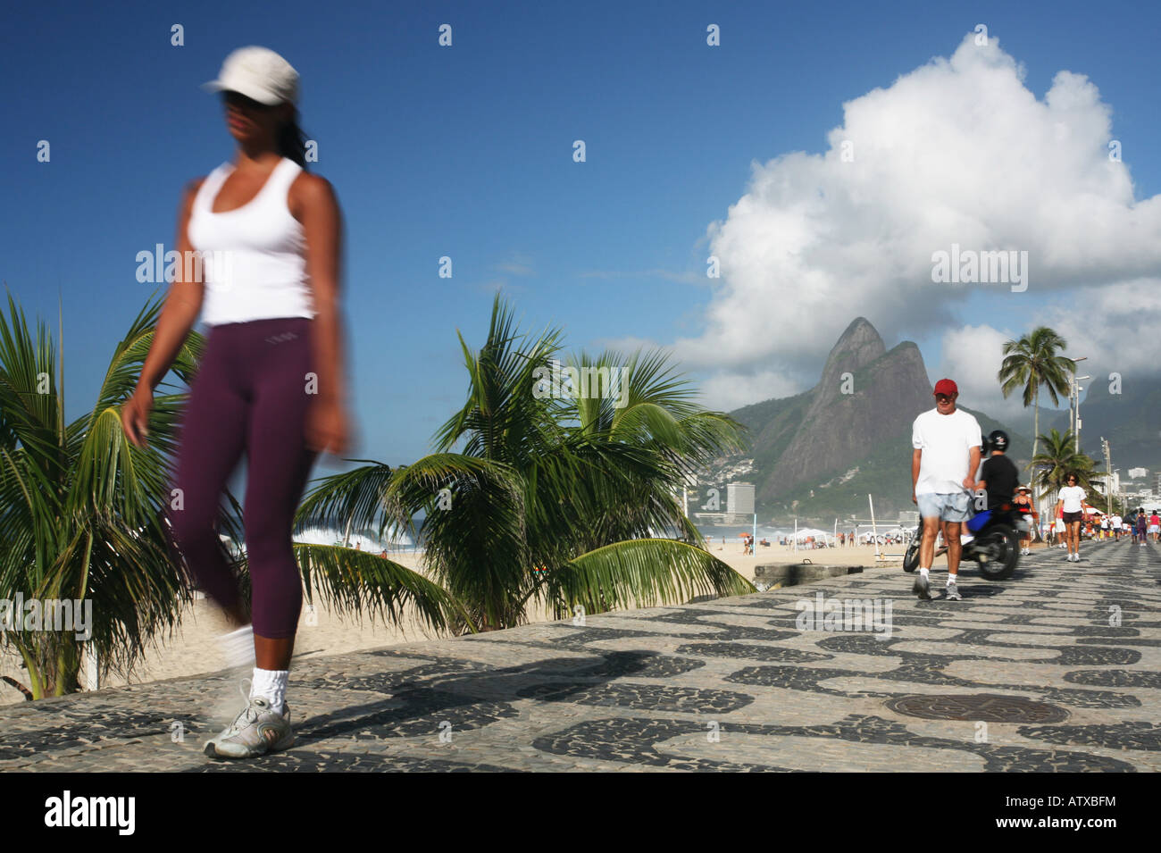 Ipanema promenade sea front with fit young woman walking, Rio de ...