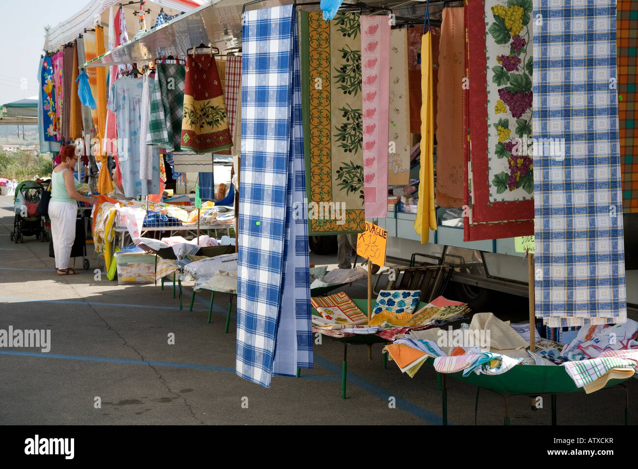 Market stall selling Cloth & Fabrics Italy, Europe, EU Stock Photo - Alamy
