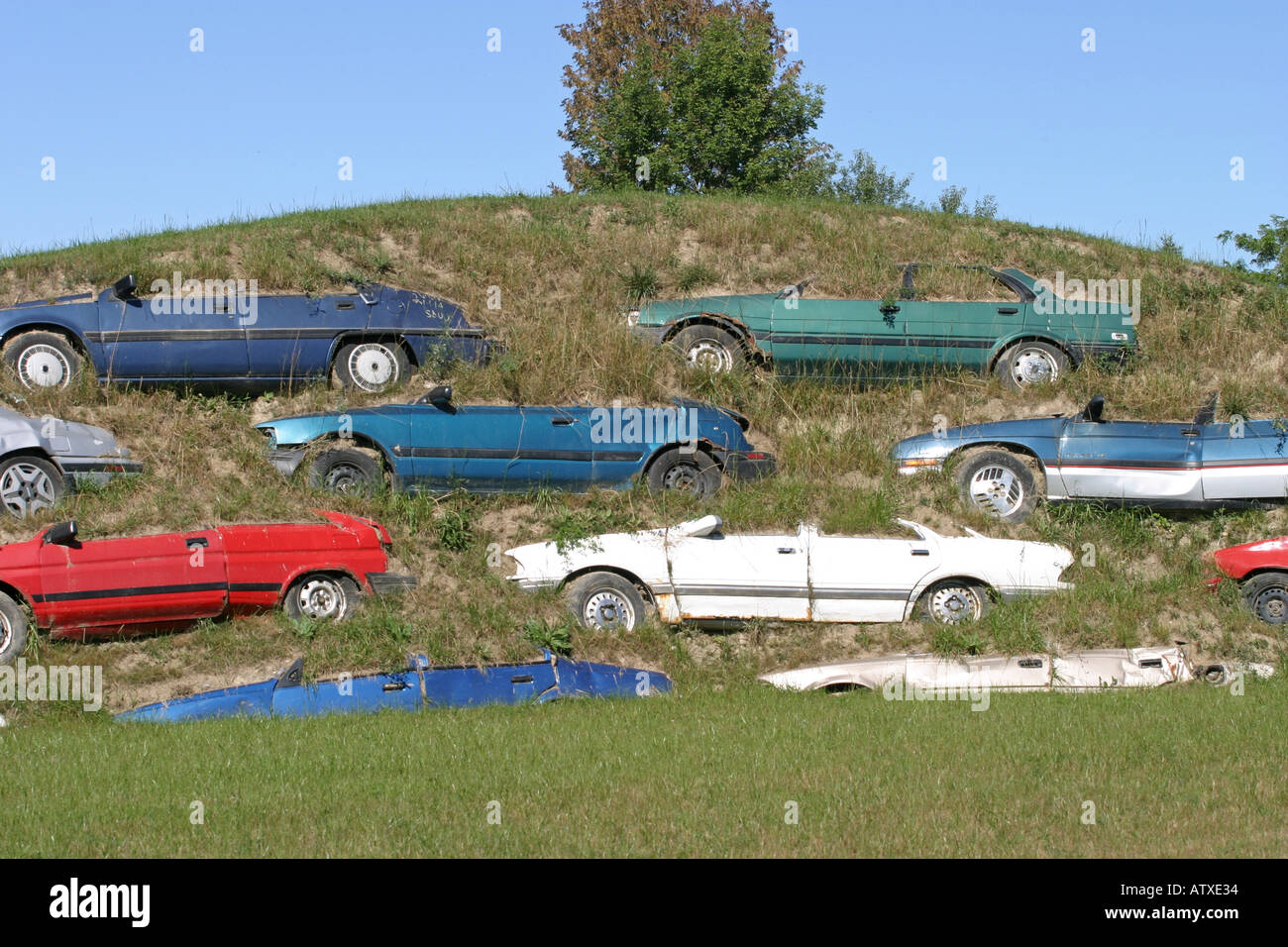 cars embedded in hillside Stock Photo - Alamy