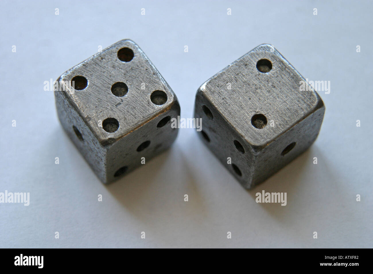Metal dice hi-res stock photography and images - Alamy
