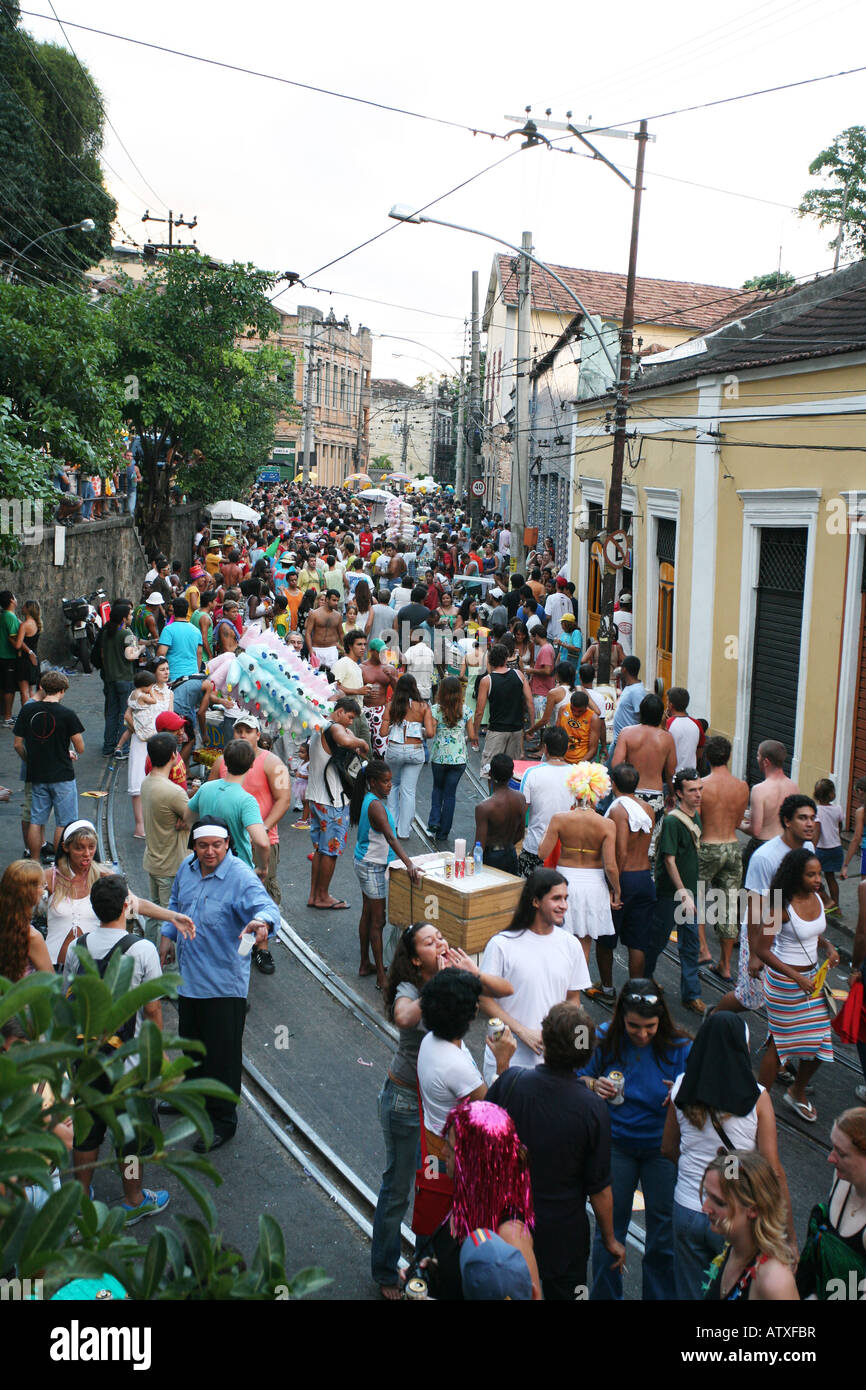 Crowds of tourists and locals in street carnival bloco in Santa Teresa ...