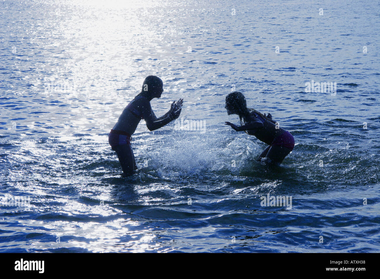 Water fight teenage hi-res stock photography and images - Alamy
