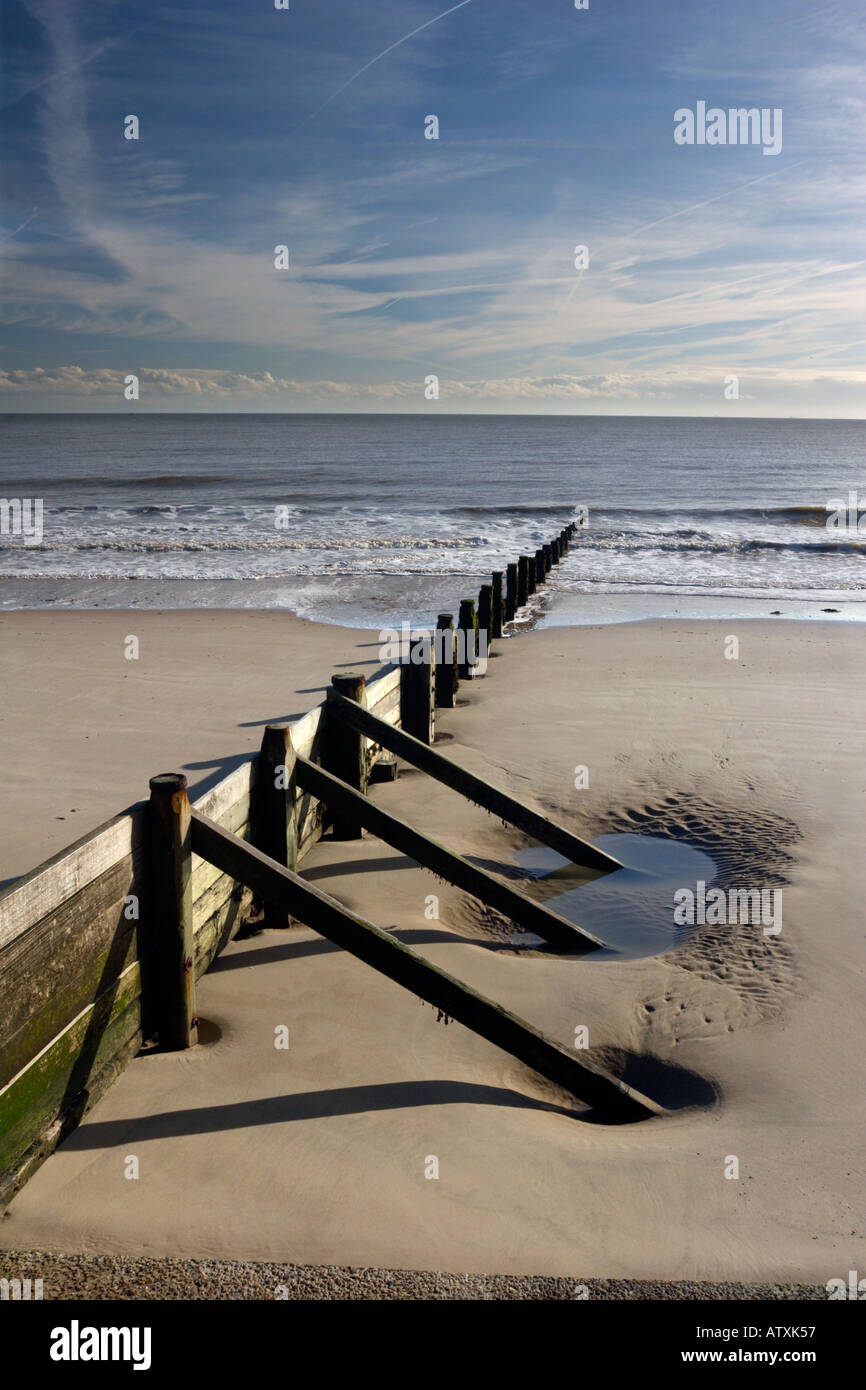Frinton on sea beach with groynes protecting from sand erosion Stock ...