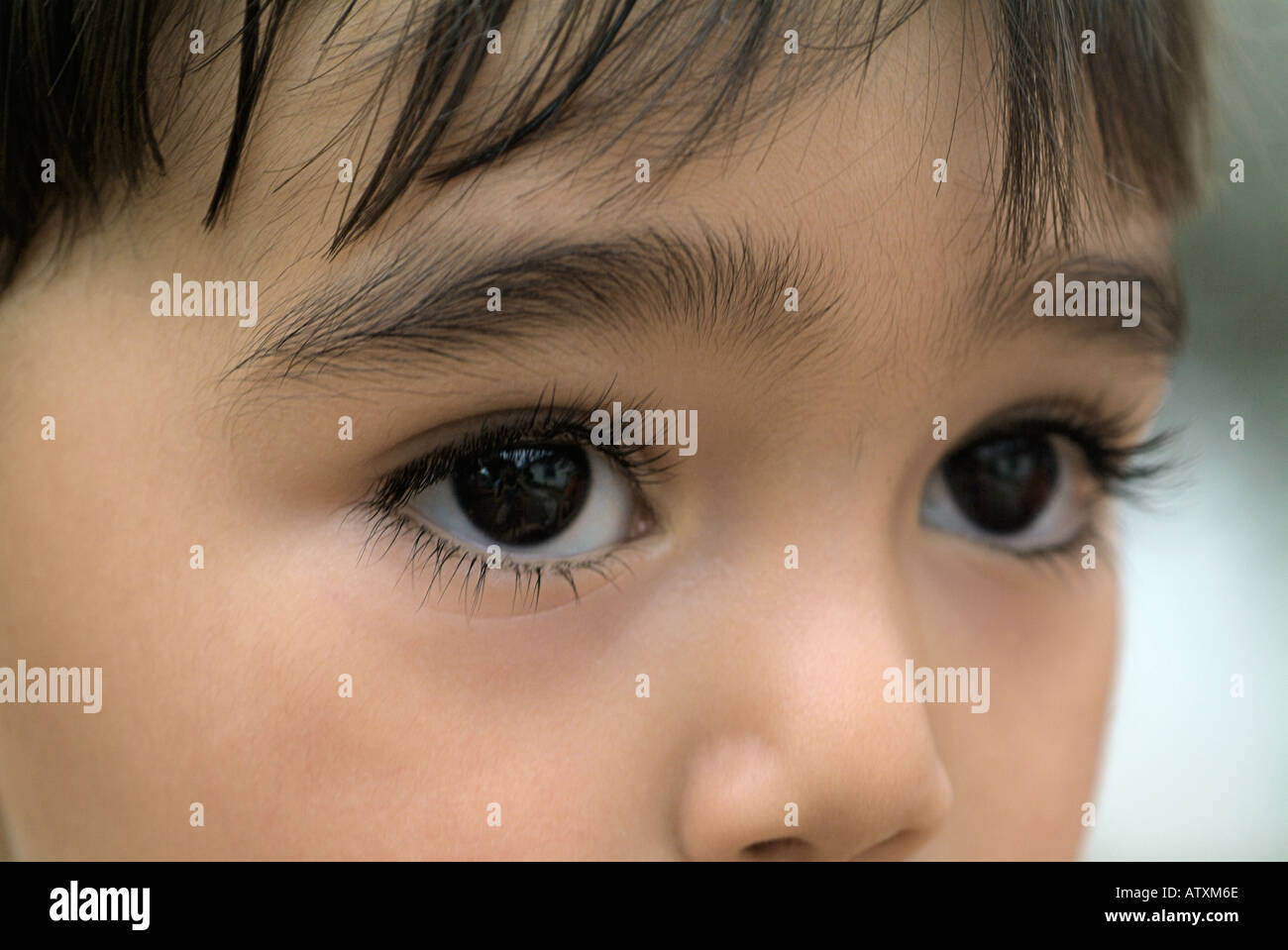 Closeup of young boys face Stock Photo - Alamy