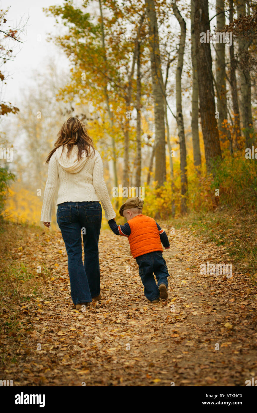 Mother and child going for a walk Stock Photo - Alamy