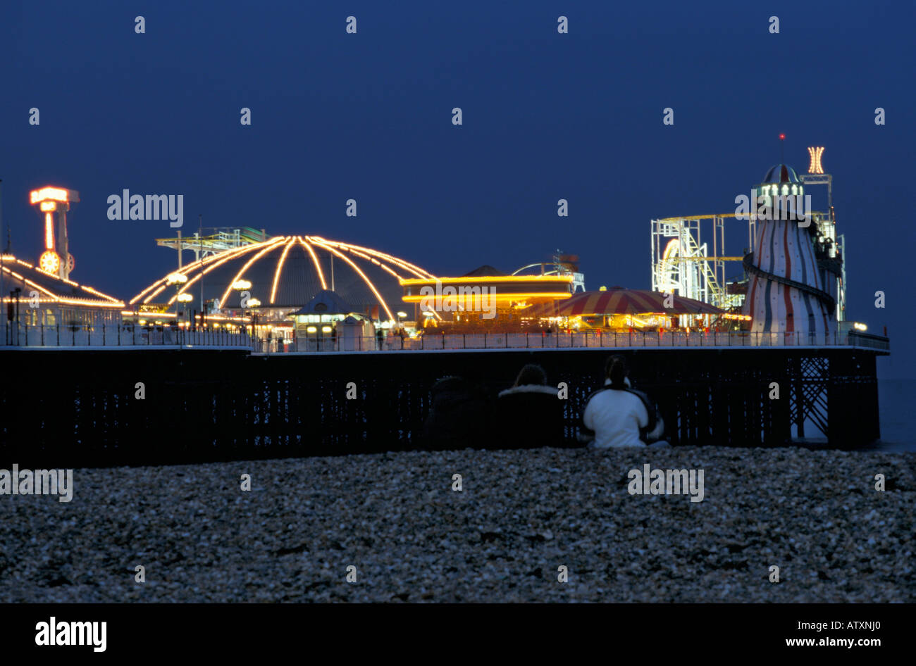 Brighton Pier lit up in the evening Brighton South East England England ...
