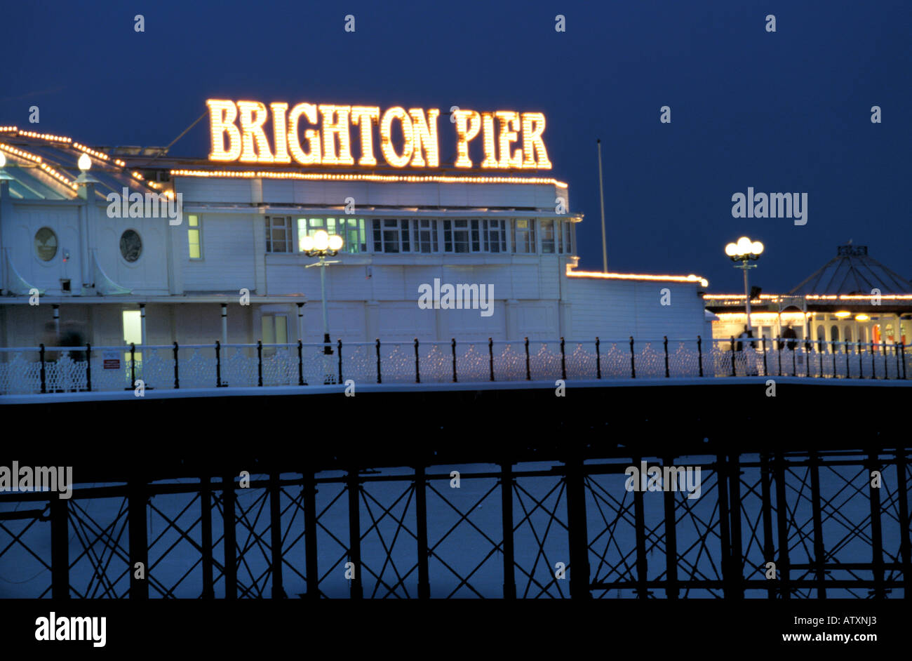 Brighton Pier lit up in the evening Brighton South East England England ...