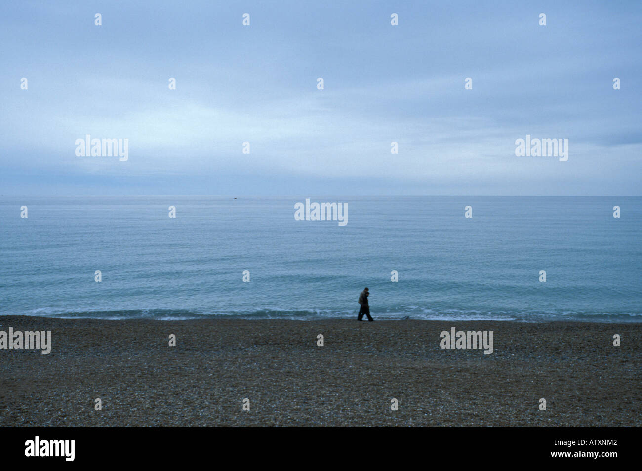 Walking alone on the seaside Brighton South East England England UK ...