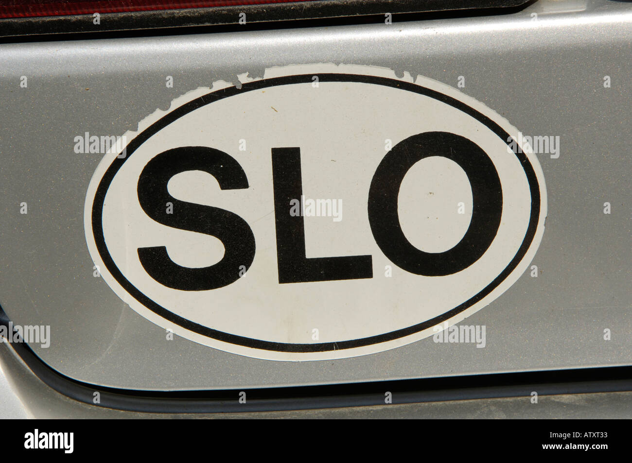 sticker SLO, international country symbol Slovenia Stock Photo - Alamy