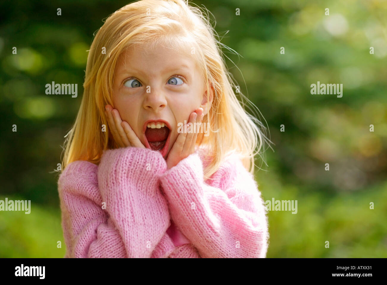 Child has goofy expression Stock Photo - Alamy