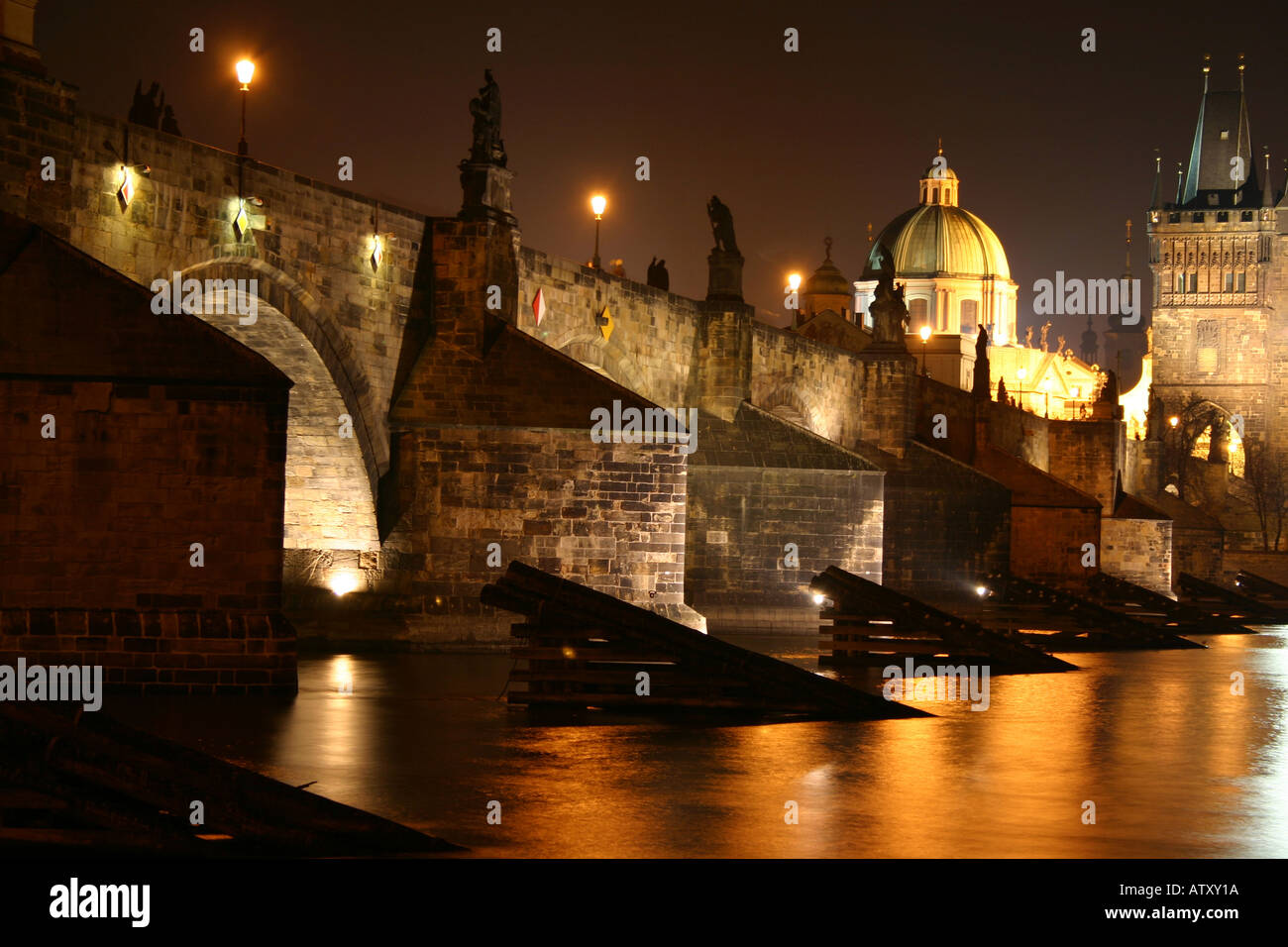 Prague Charles Bridge lit at night Stock Photo - Alamy