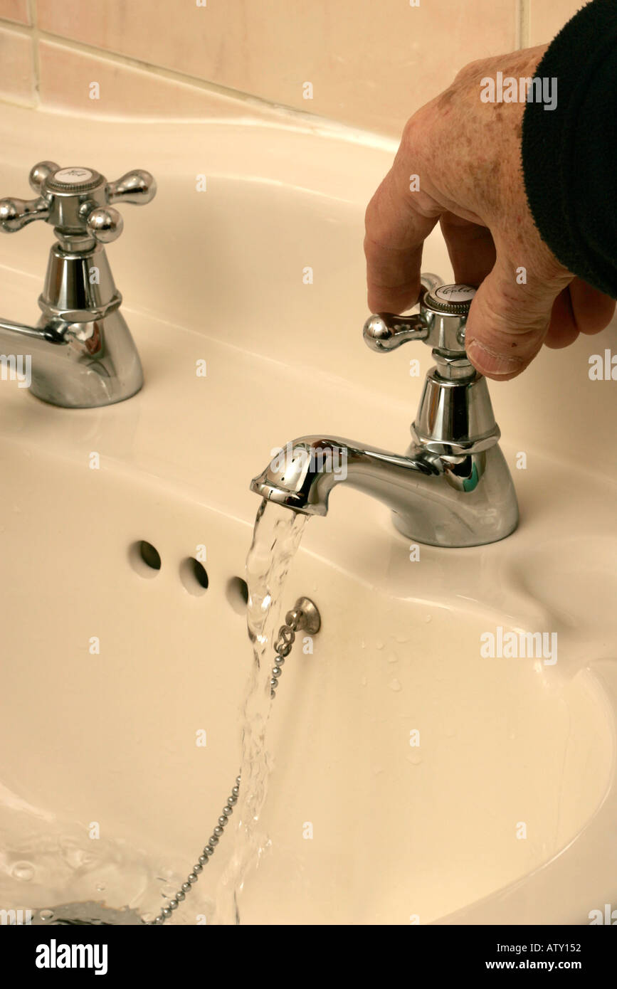 Hand Turning Tap Stock Photos & Hand Turning Tap Stock Images - Alamy