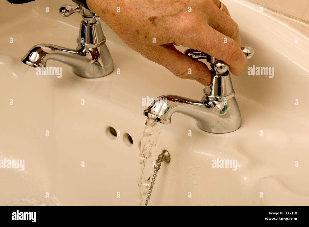 Hand Turning Tap Stock Photos & Hand Turning Tap Stock Images - Alamy